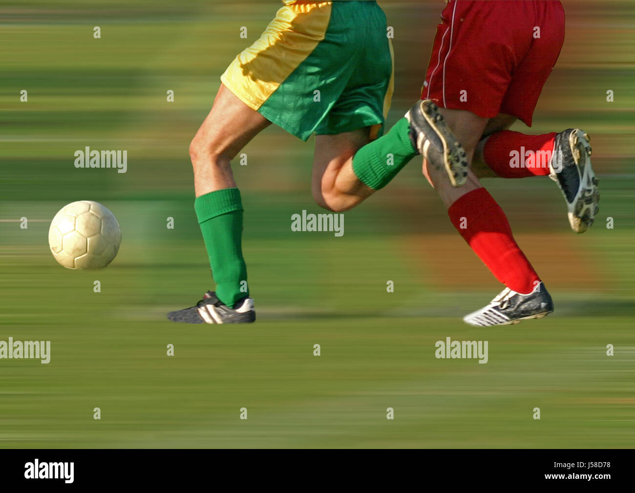 Feet of red team soccer player hi-res stock photography and images - Alamy