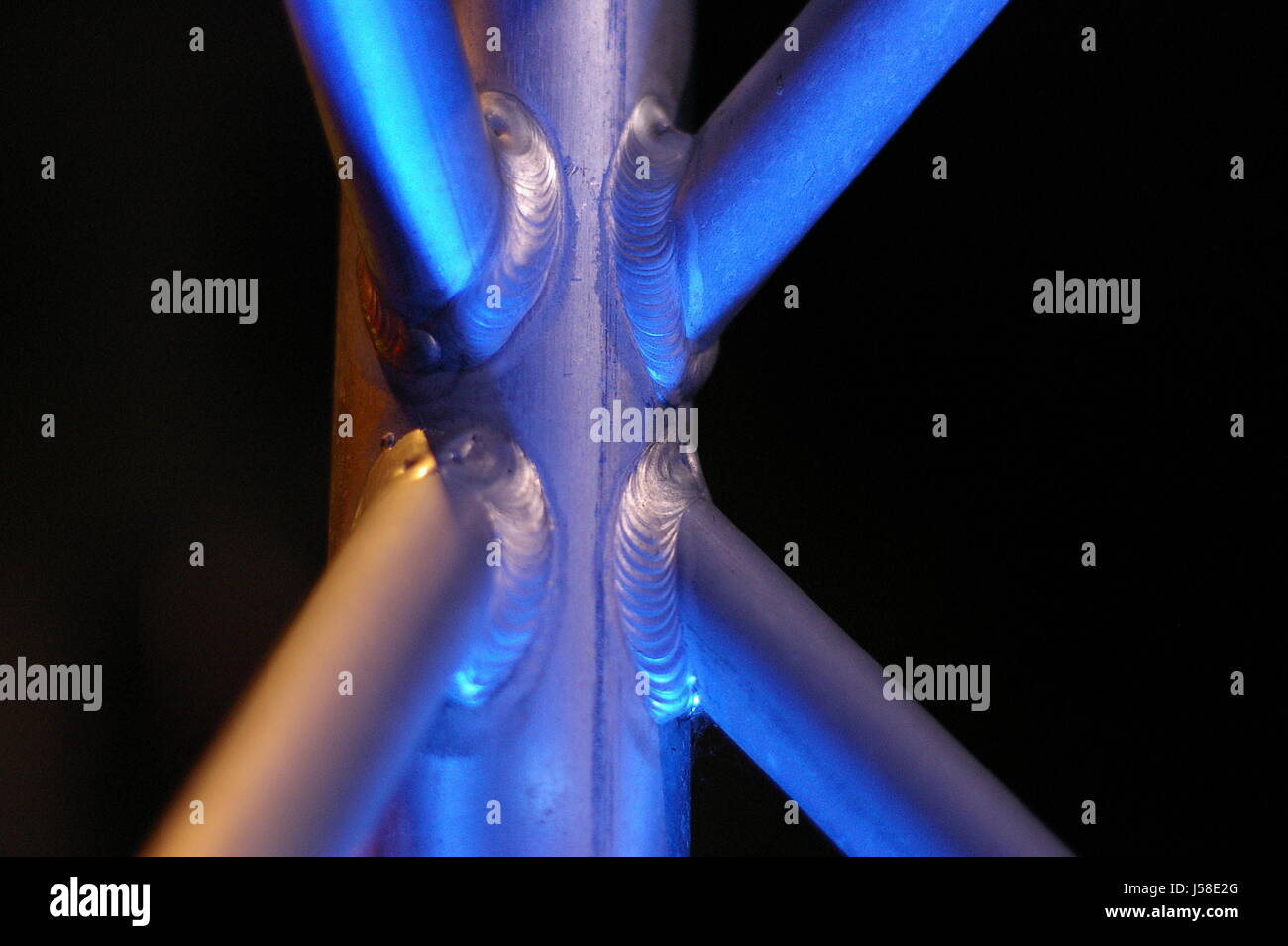 blue night photograph iron steel scaffold scaffolding building ...