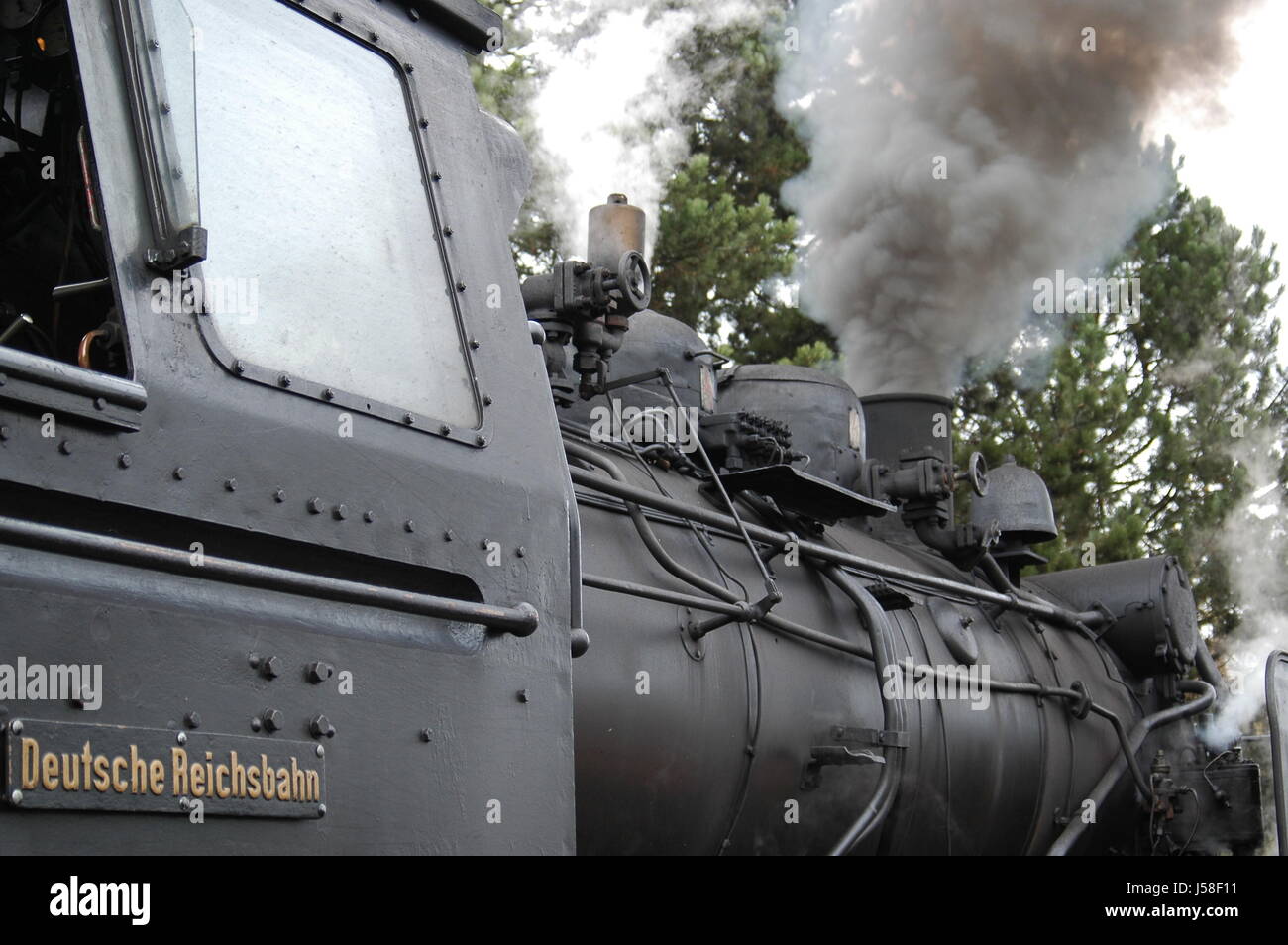 smoke smoking smokes fume railway locomotive train engine rolling stock ...