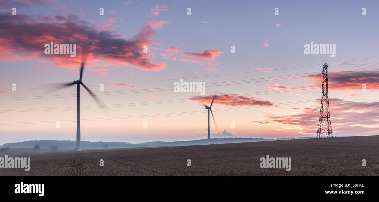 Wind Turbines at Sunrise Stock Photo - Alamy