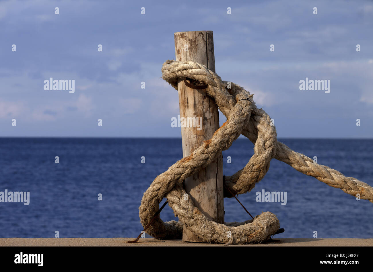 Rope on seafront and sea in sun autumn day. Turkey, Erdek, coast of ...