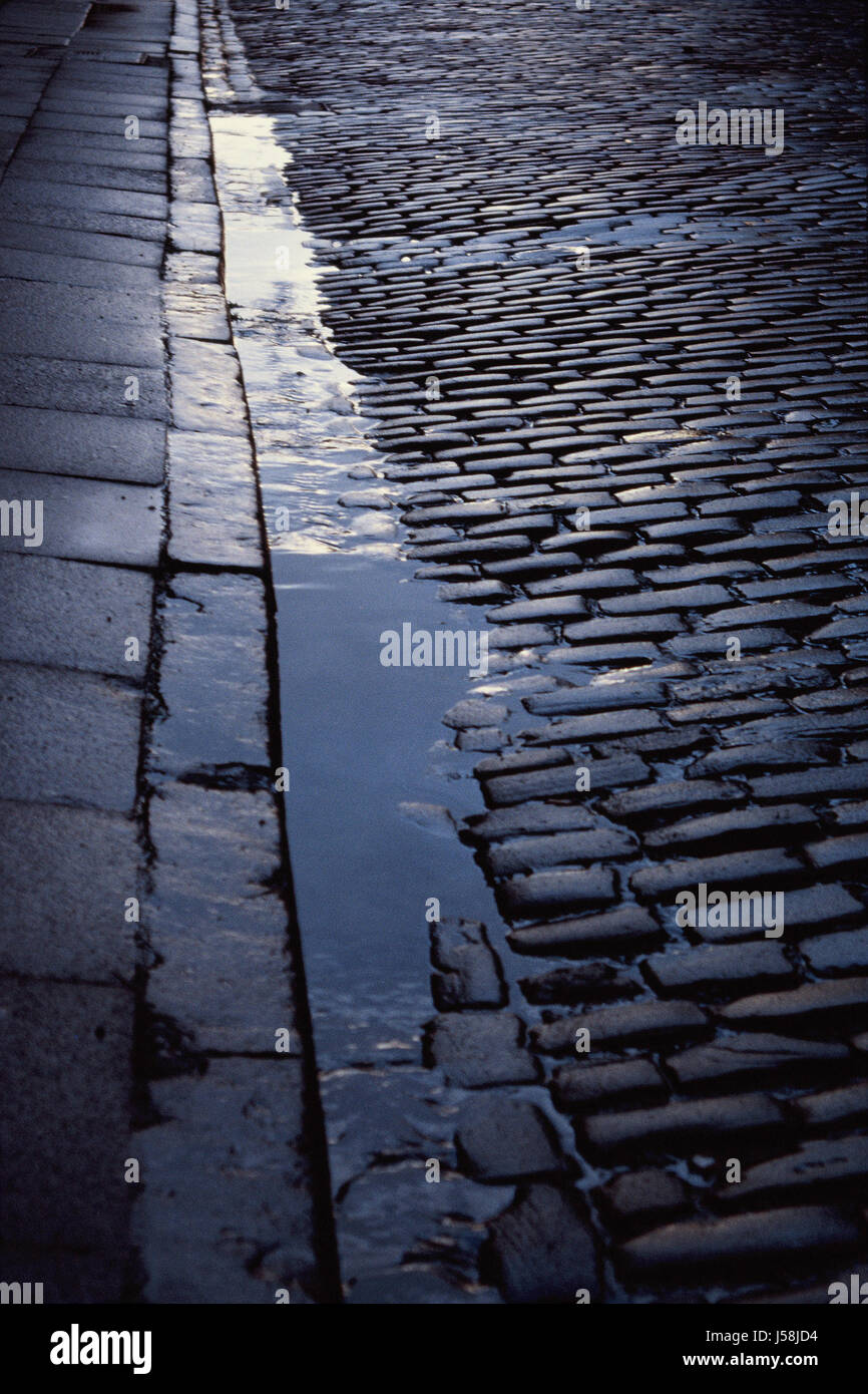 city town pavement sidewalk bouldering cobblestone mud street road ...