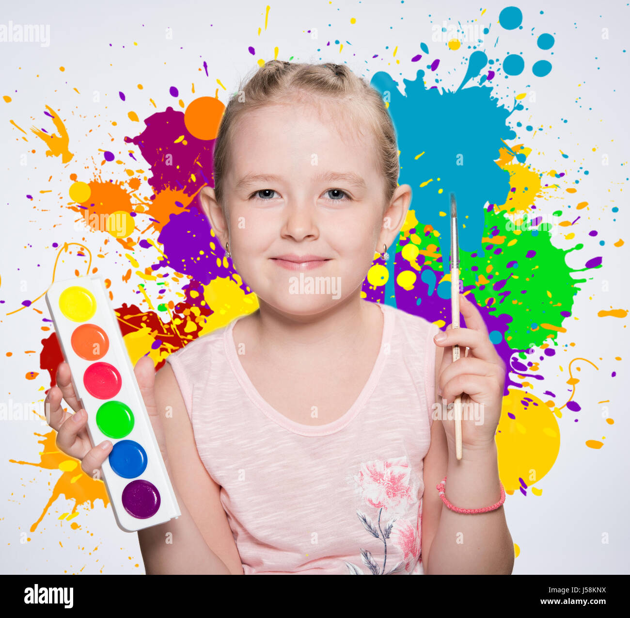 young artist with bright colors Stock Photo - Alamy