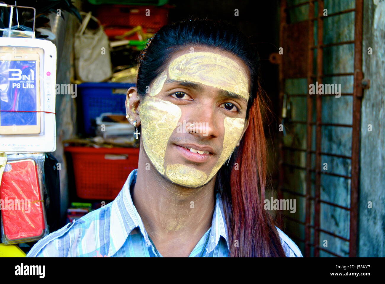Young shop worker, Yangon, Myanmar Stock Photo - Alamy