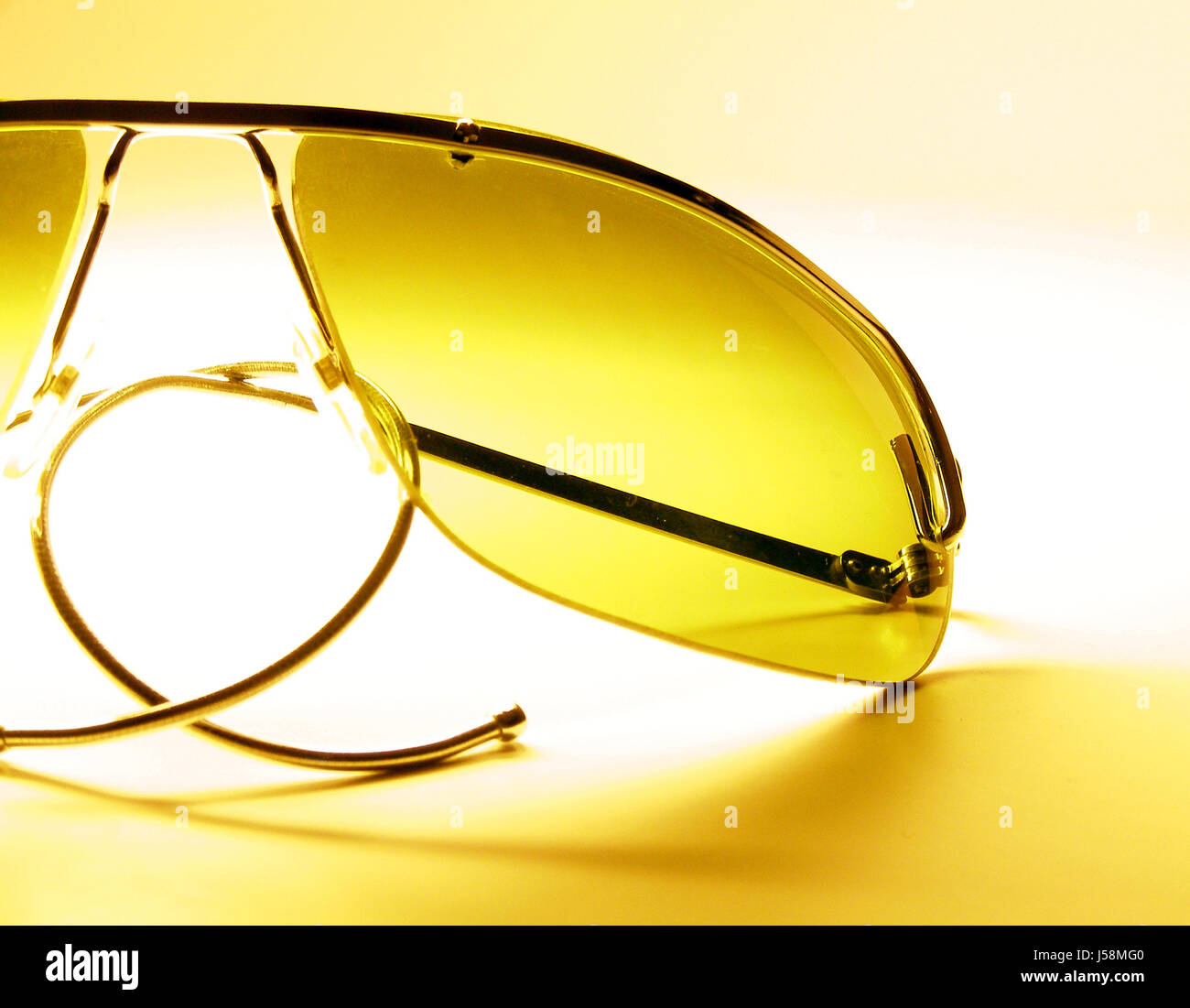 yellow sun glass Stock Photo - Alamy