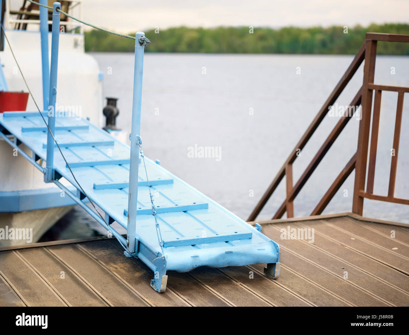 A marina with ship and gangplank, outdoor shot, concept of travel by ...