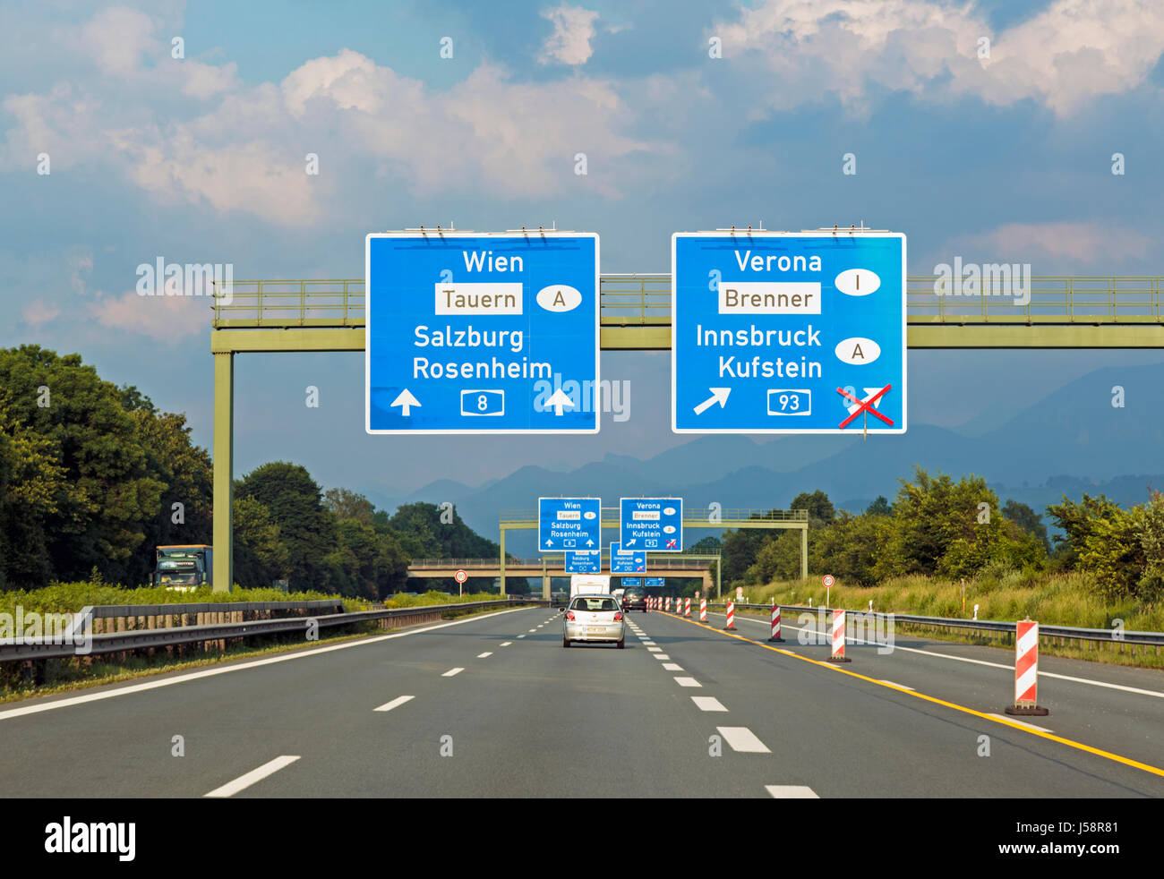 Signs to German, Austrian and Italian destinations on the E52 highway ...