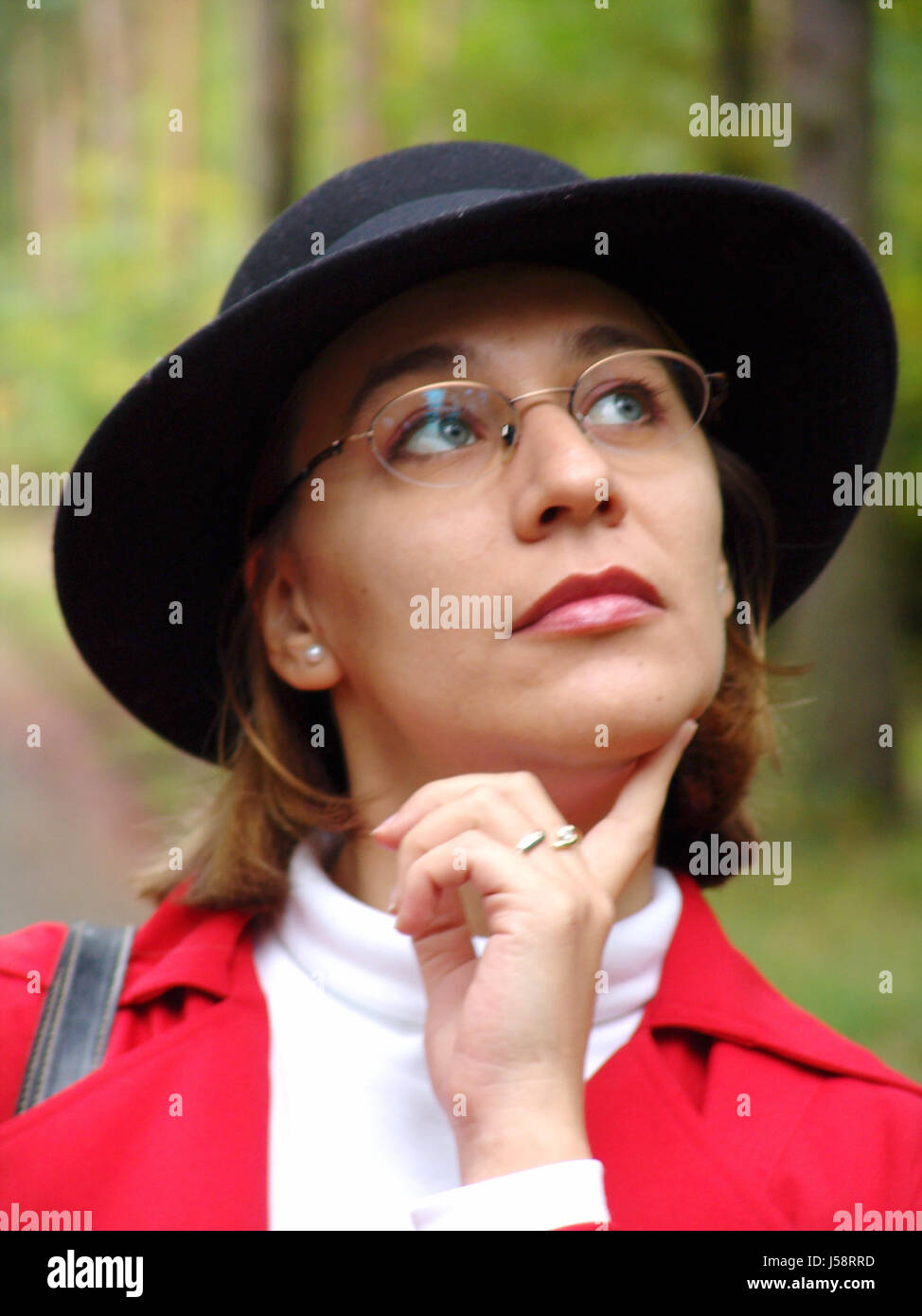 Woman meditative face hat hi-res stock photography and images - Alamy