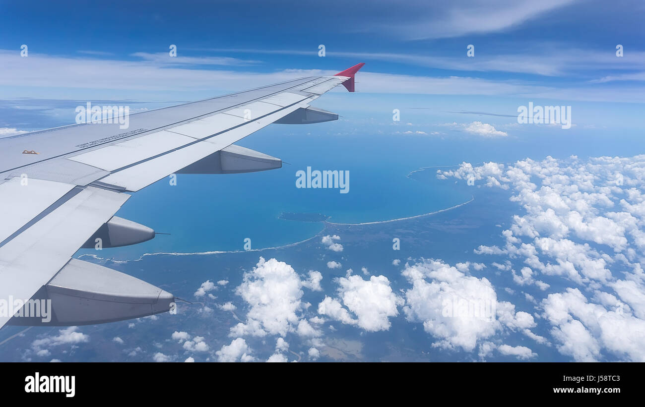 The view from the height of the window jet aircraft. white cloud and ...