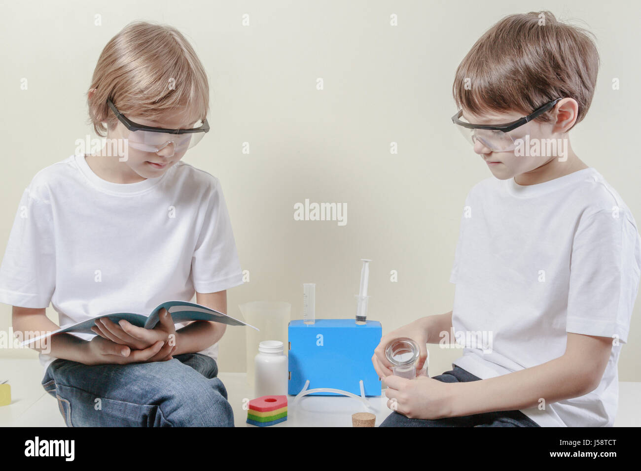 Kids preparing to make science experiments. Education concept Stock ...