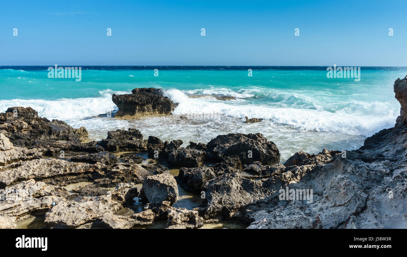 Waves beat on the rocky shore, Mediterranean Sea. Cyprus Stock Photo ...