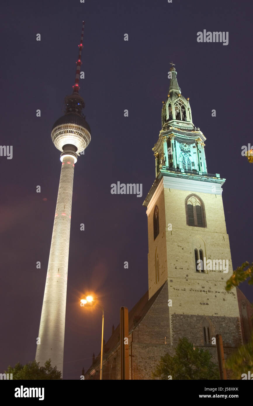 church night nighttime night photograph towers steeple television ...