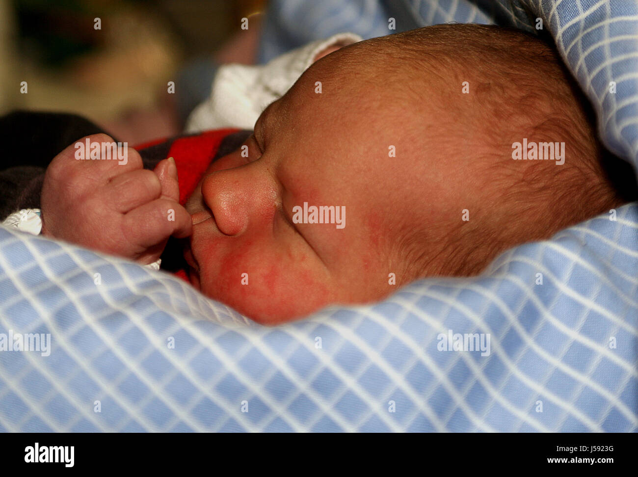 hand birth childbirth parturition delivery born mouth face eyes hairs ...