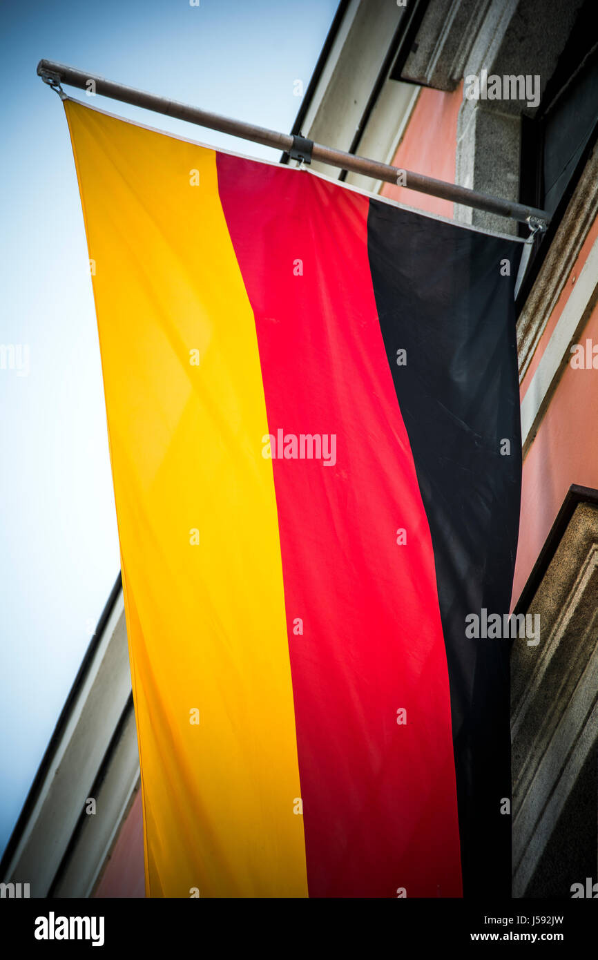 German flag banner on high building Stock Photo - Alamy