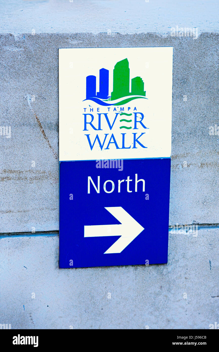 The Tampa Riverwalk sign on the Hillsboro River wall in downtown Tampa ...