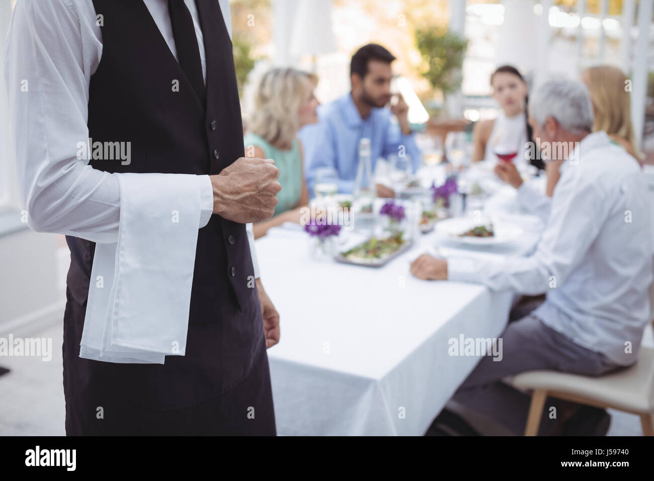 Woman waiter dining hi-res stock photography and images - Alamy