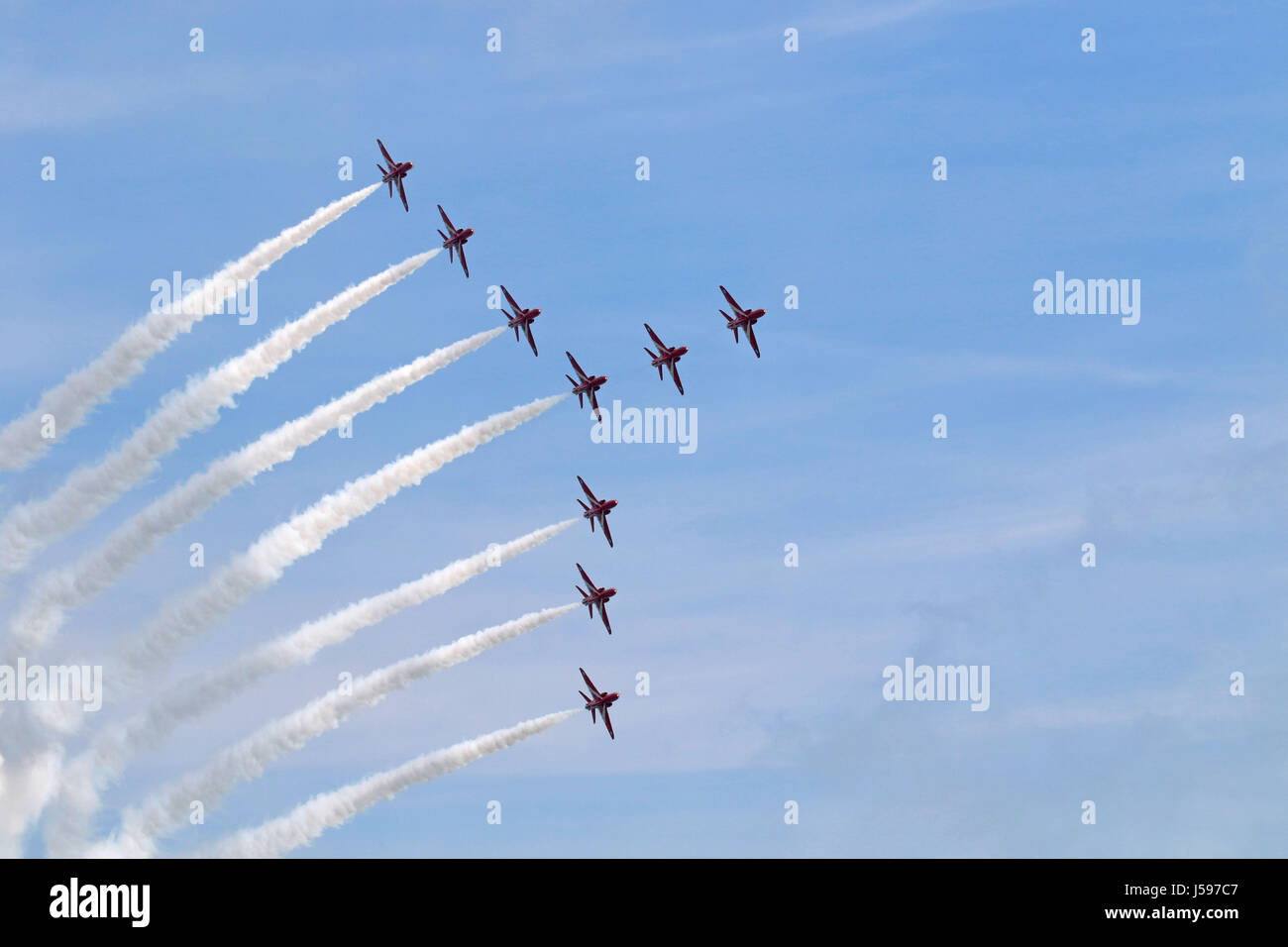 Red arrows aerobatic display team swan formation over Eastbourne UK ...