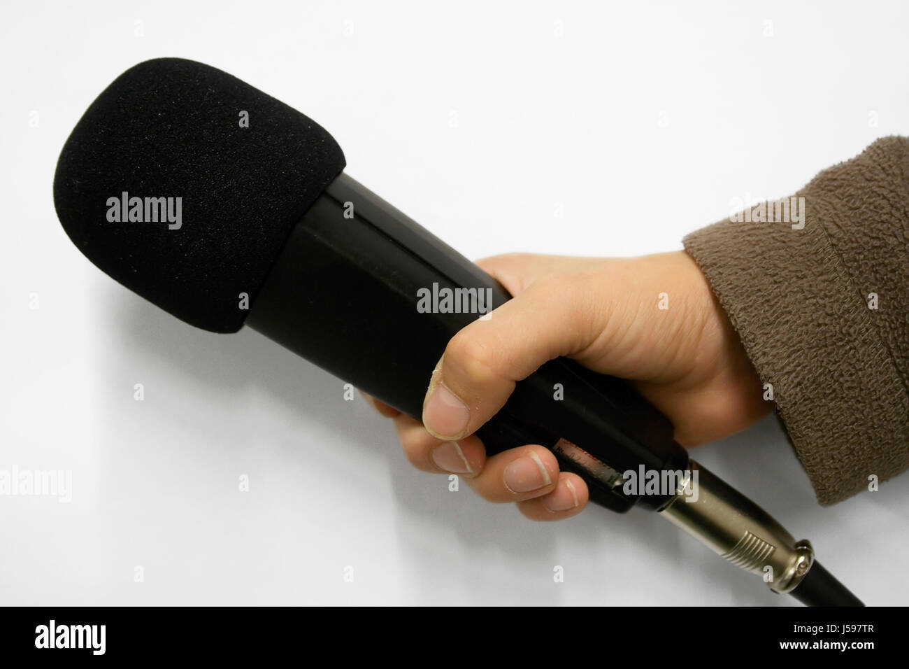 children hand with microphone Stock Photo - Alamy