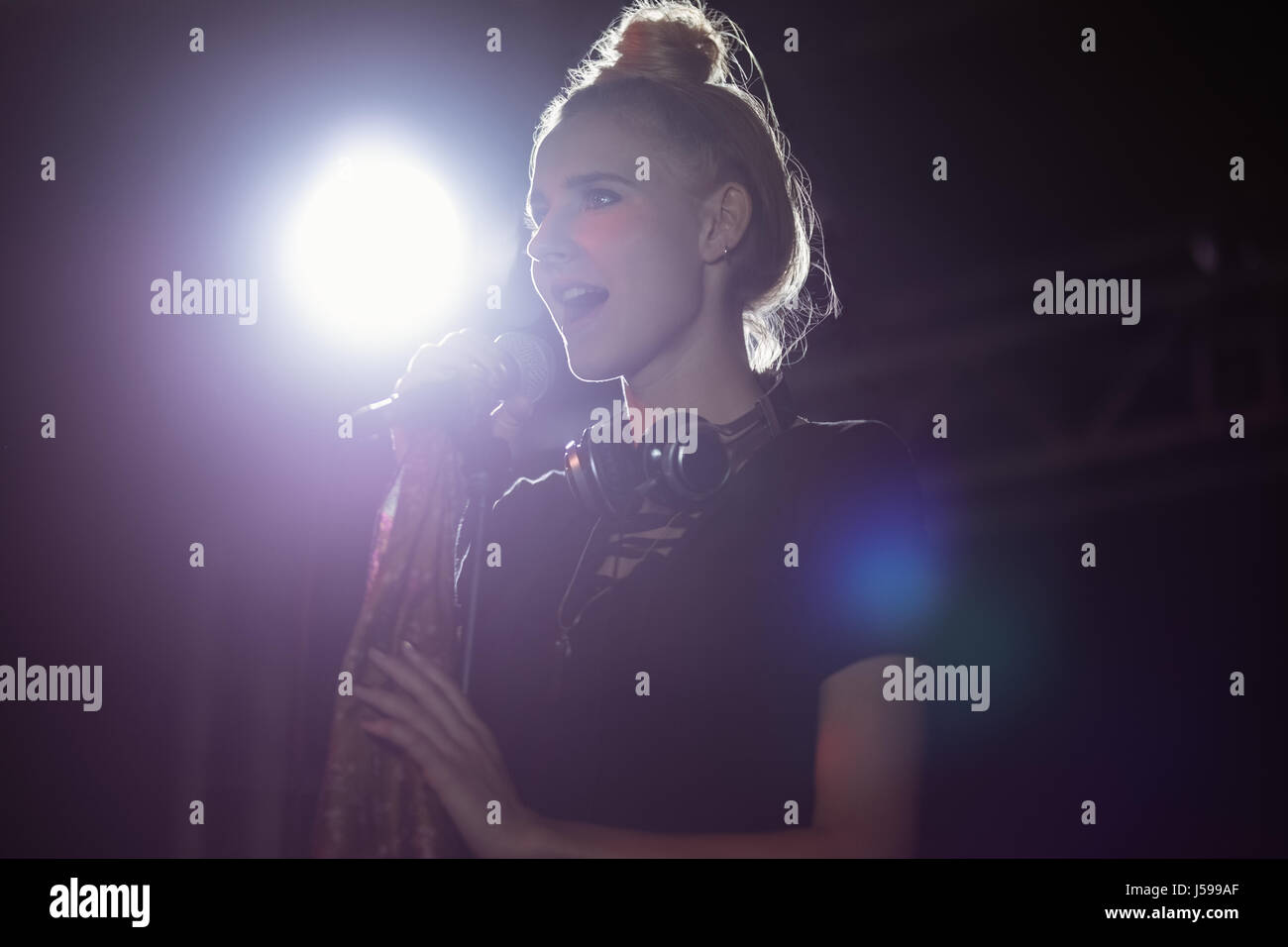 Female singer performing hi-res stock photography and images - Alamy