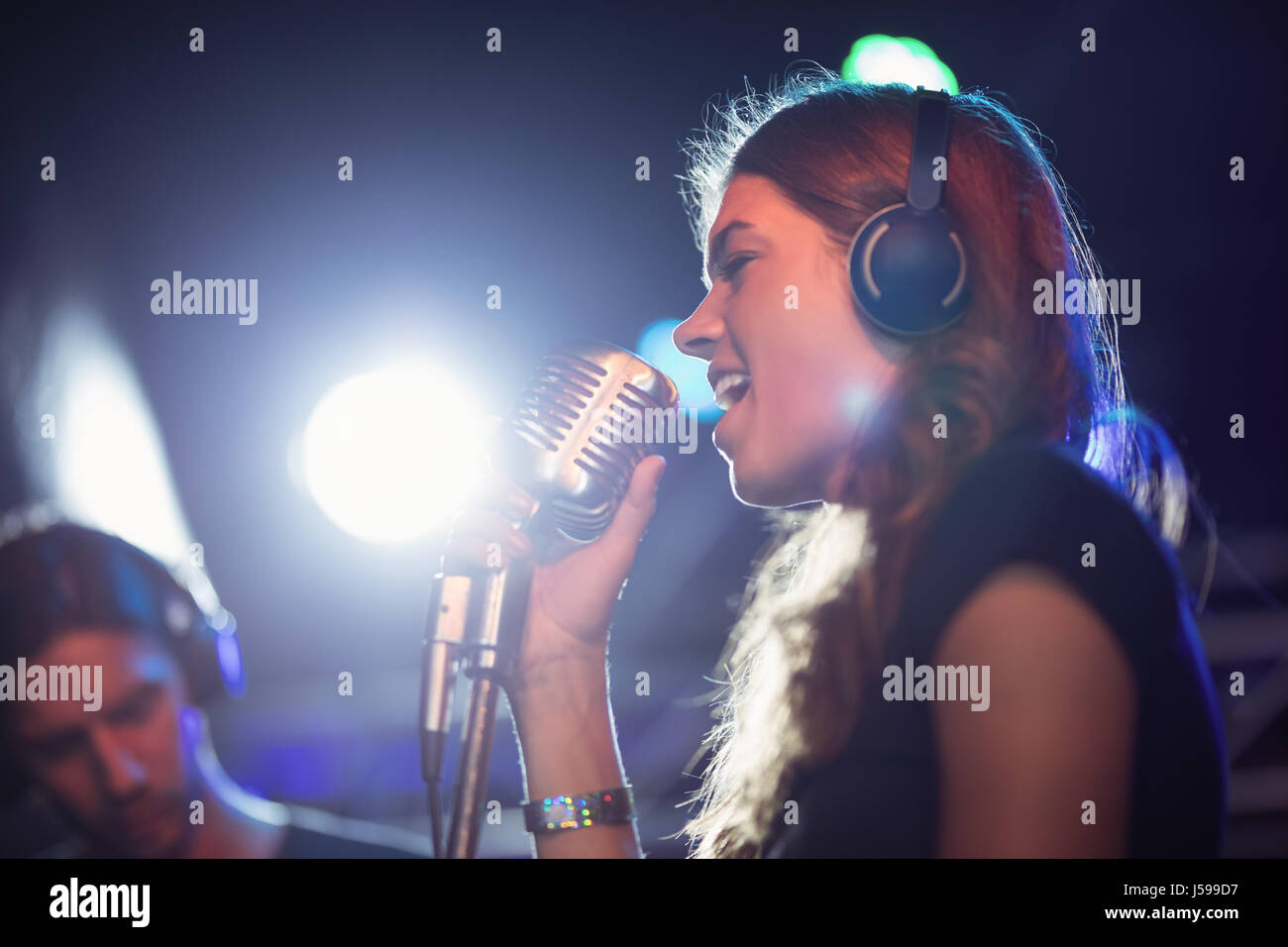 Low angle shot female performer hi-res stock photography and images - Alamy