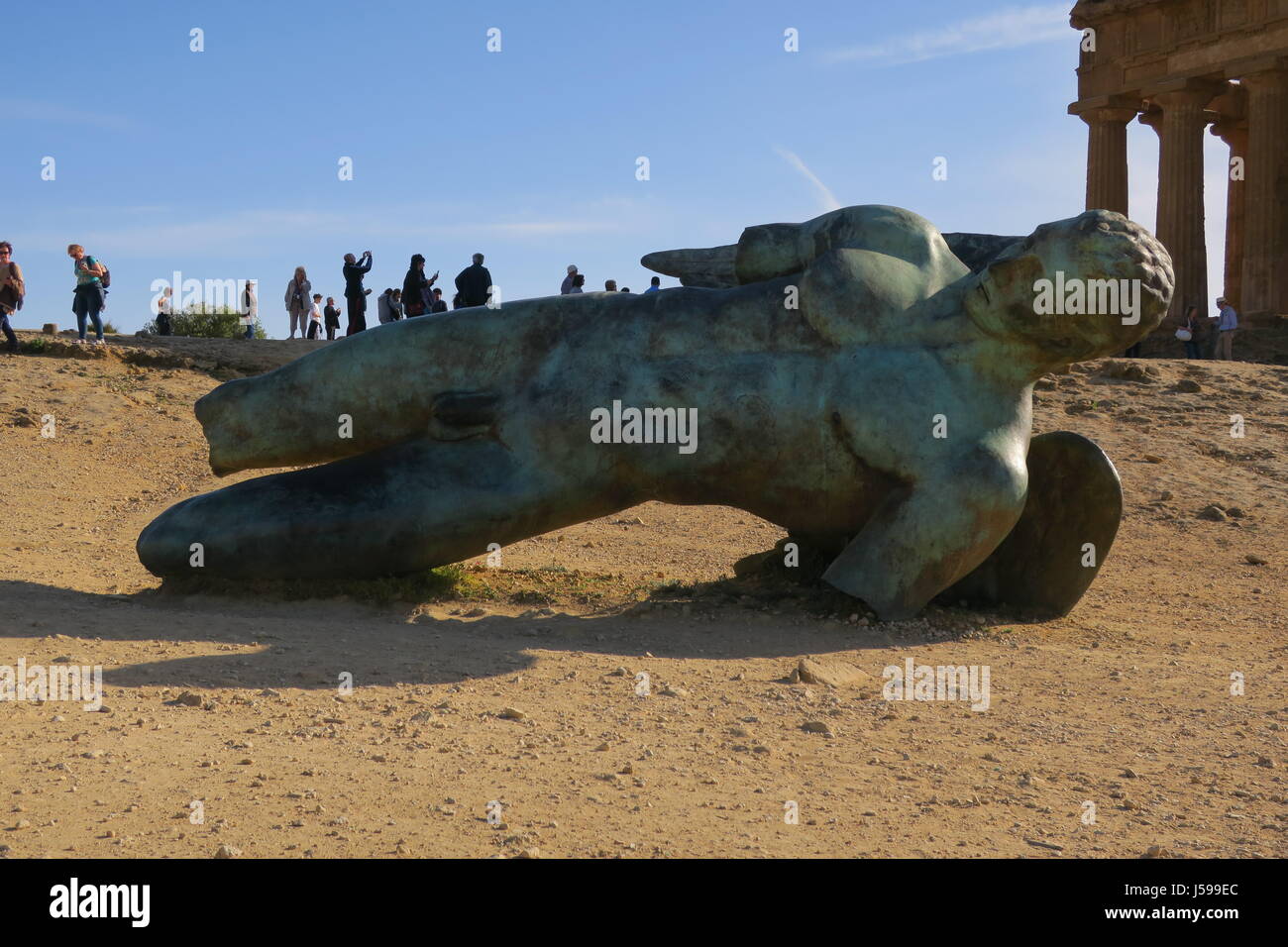 Greek temple of concordia with bronze statue hi-res stock photography ...