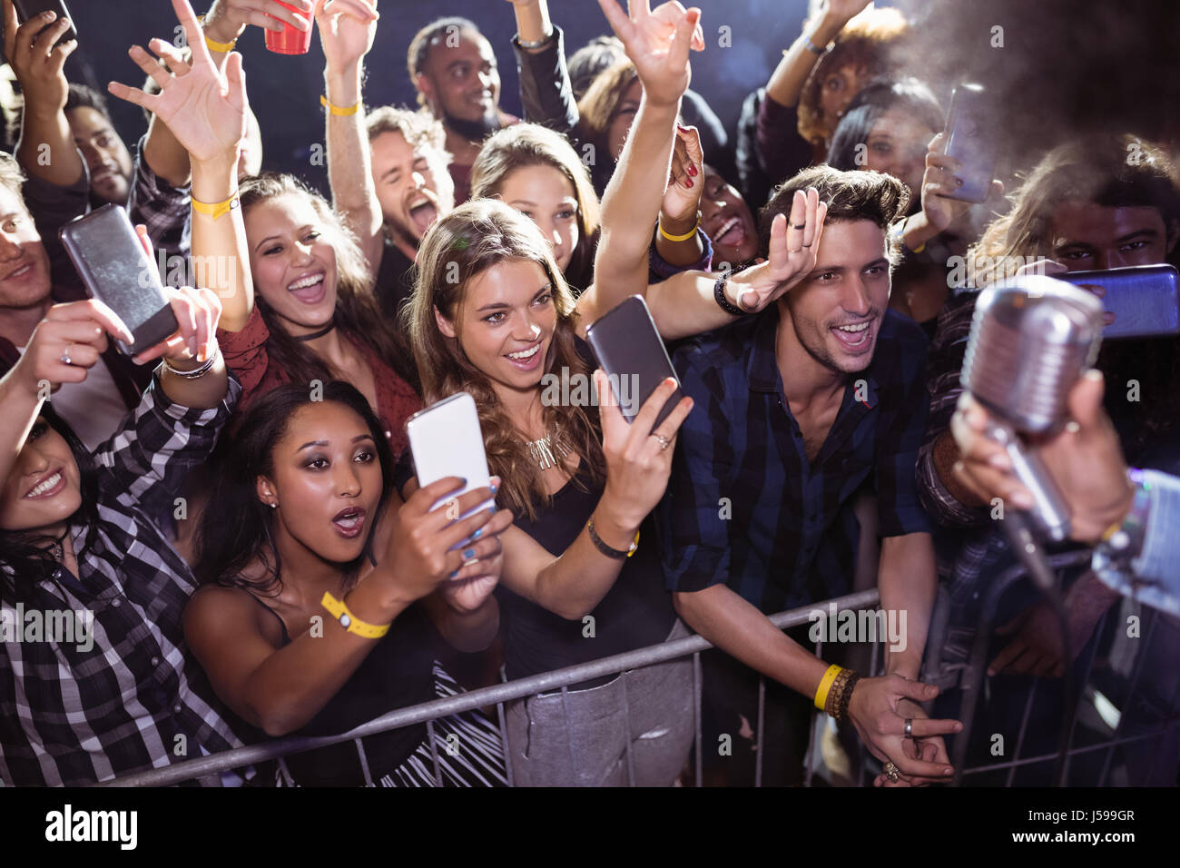 Cheerful crowd hi-res stock photography and images - Alamy