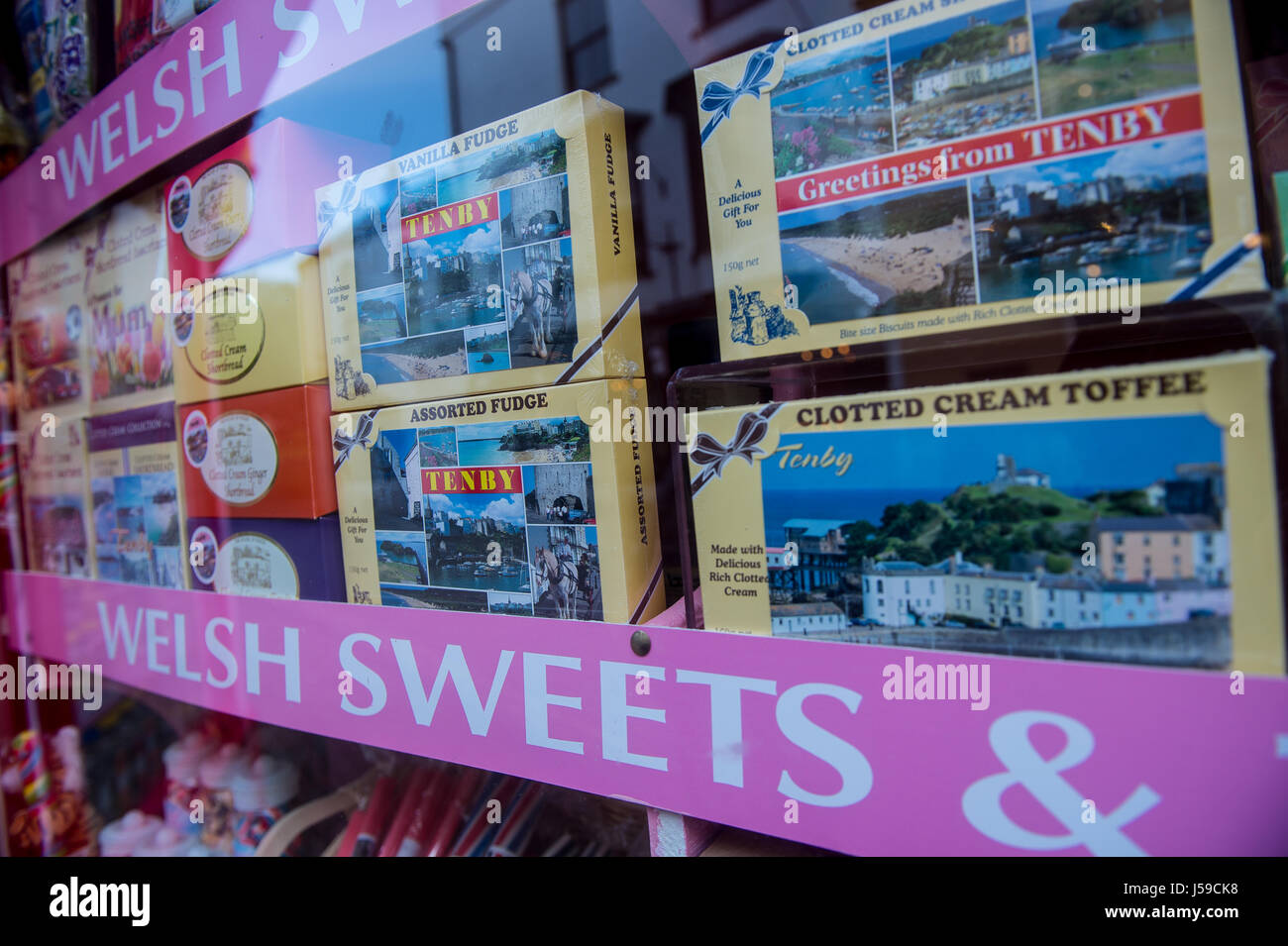 Selection of Welsh sweets shot through a window at Tenby, Pembrokeshire ...
