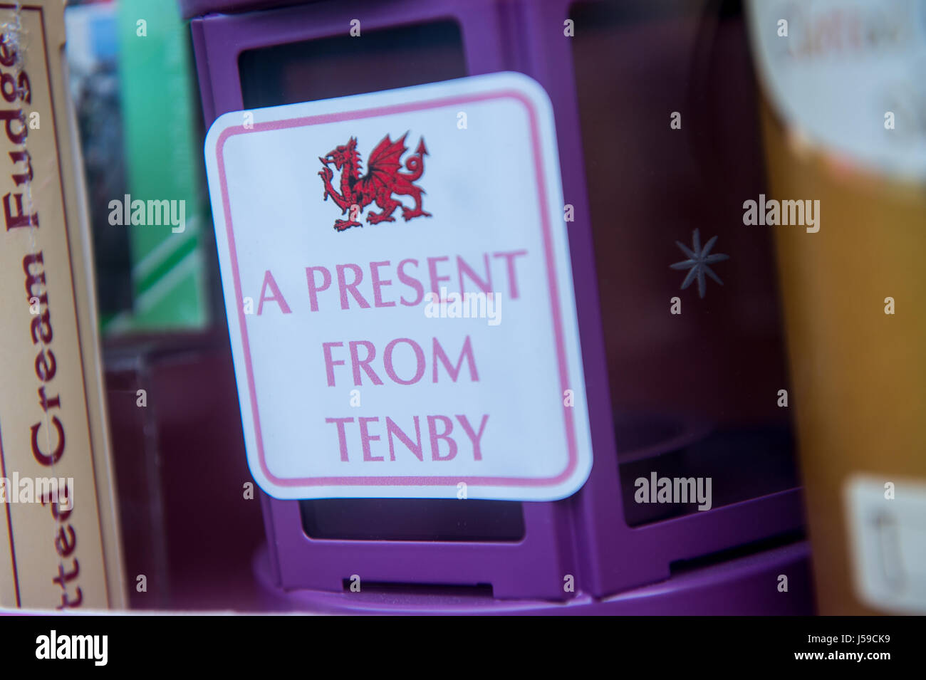 Selection of Welsh sweets shot through a window at Tenby, Pembrokeshire ...