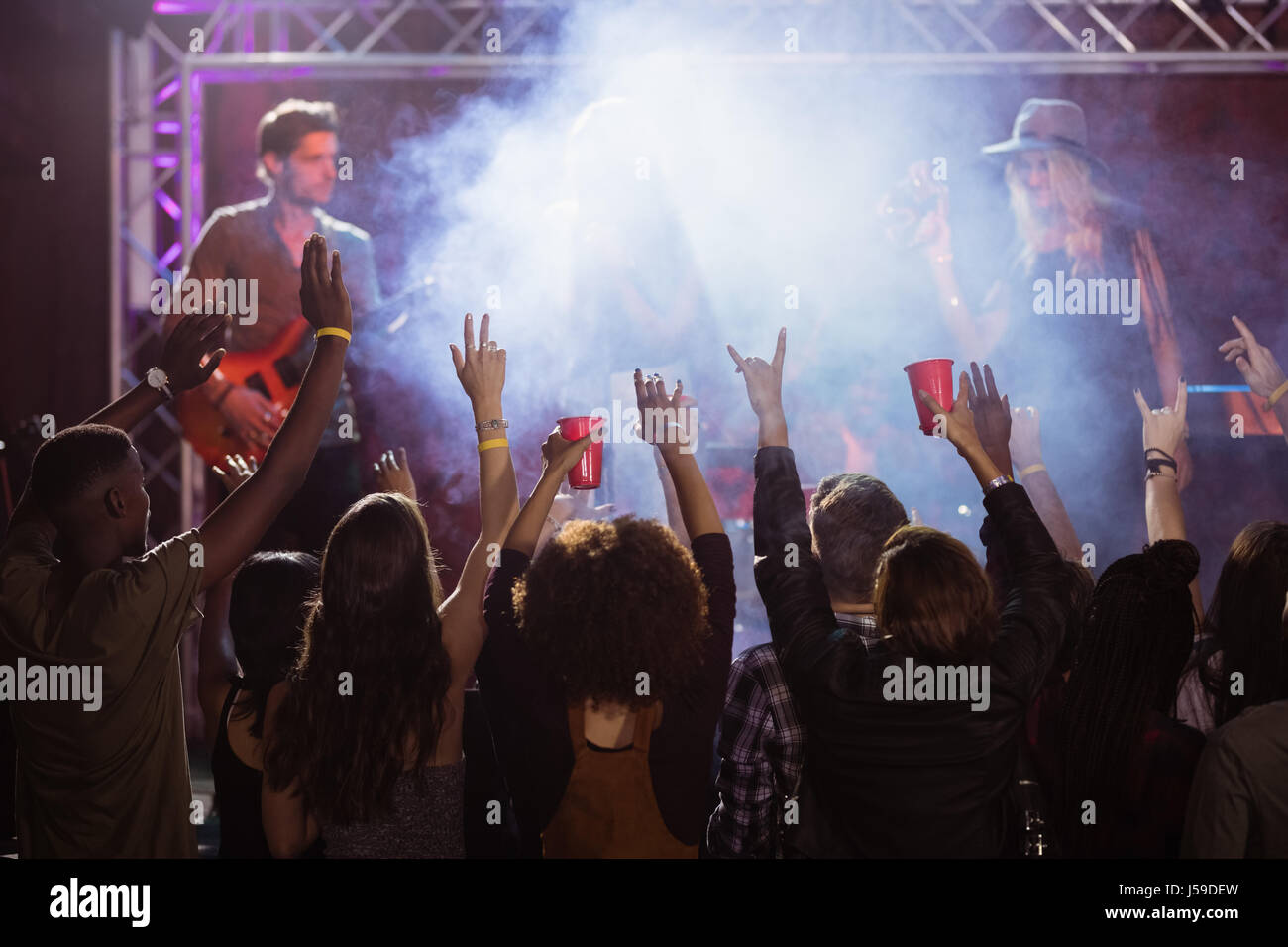 Male fans at concert hi-res stock photography and images - Alamy