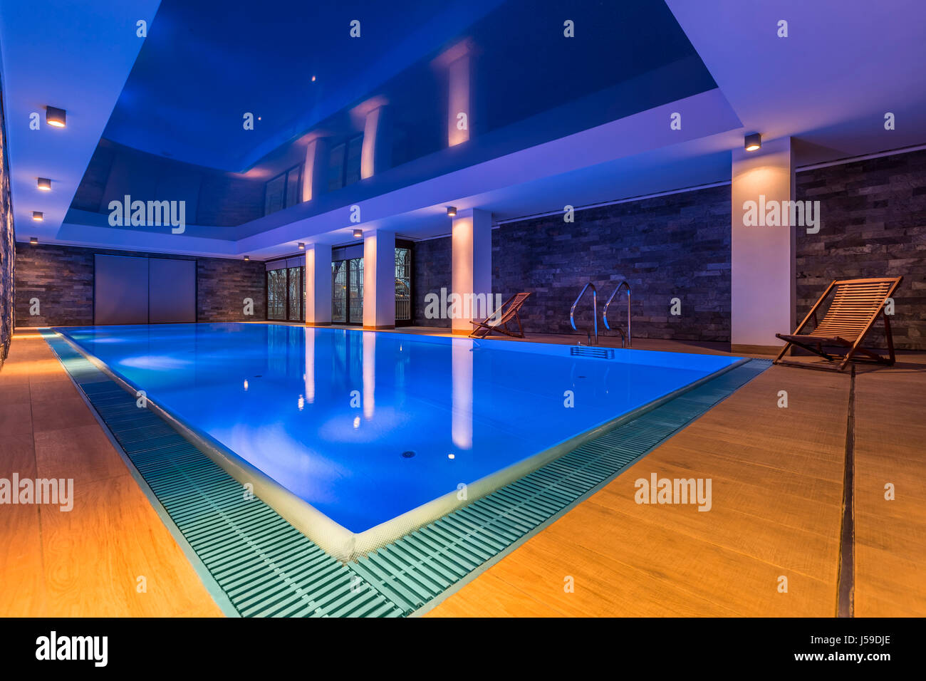 Relaxation place at elegant swimming pool in luxury hotel spa Stock ...