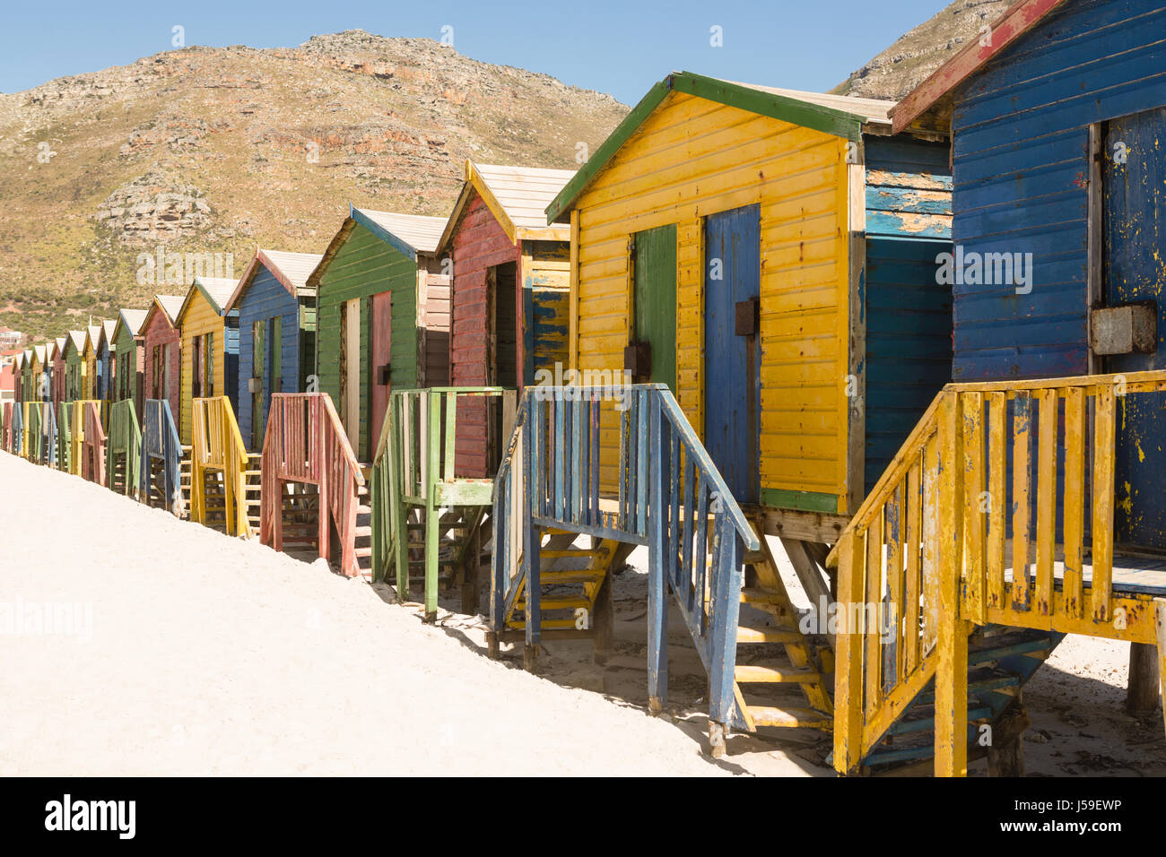Close up of multi colored houses at beach during suny day Stock Photo ...