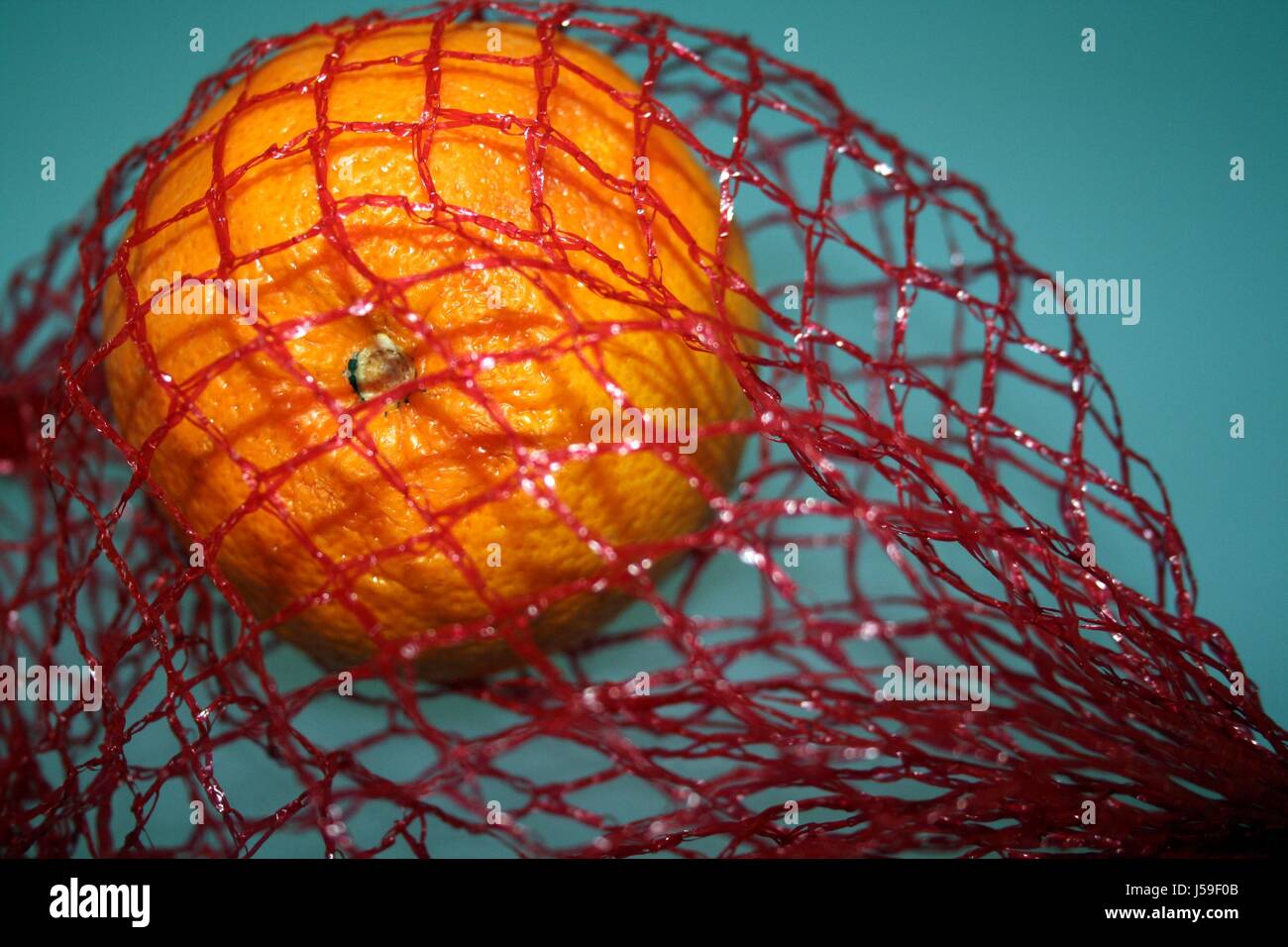 Red net packaging hi-res stock photography and images - Alamy
