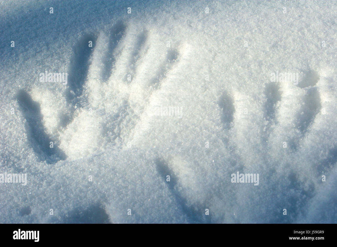 hand hands winter cold sense ice frost track freeze imprints printouts ...