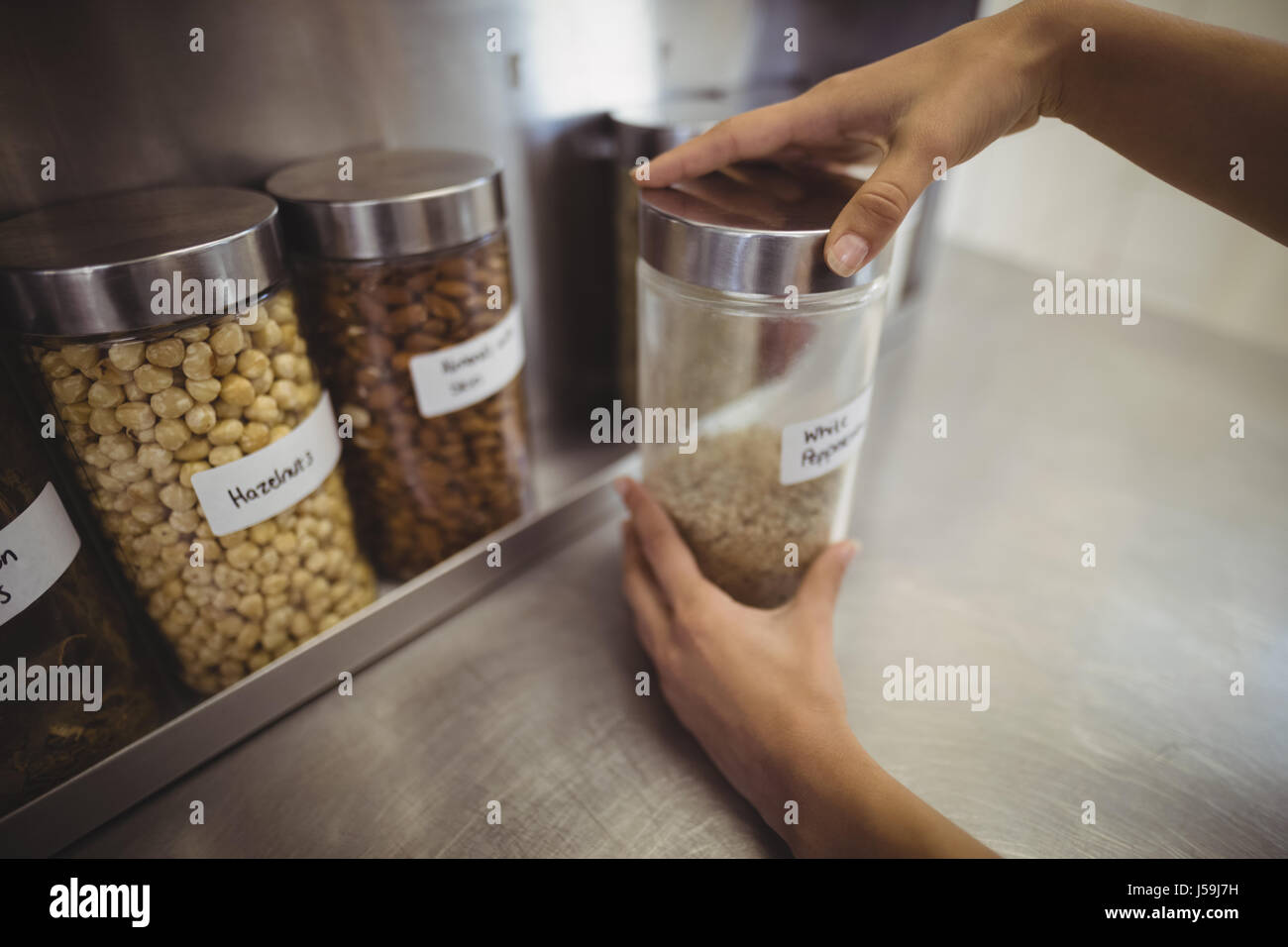 Woman spice jar hi-res stock photography and images - Alamy
