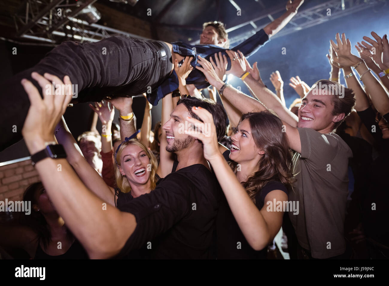 Cheerful crowd hi-res stock photography and images - Alamy