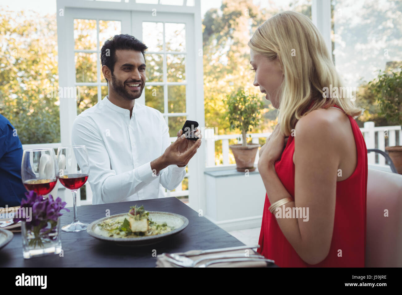 Woman in 50s surprised engagement hi-res stock photography and images ...