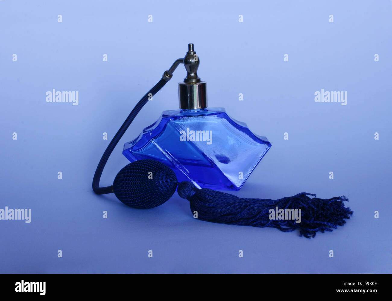 blue perfume bottle Stock Photo - Alamy