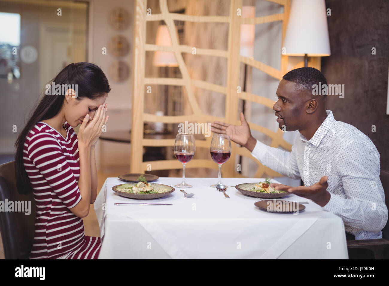 Couple argument restaurant hi-res stock photography and images - Alamy