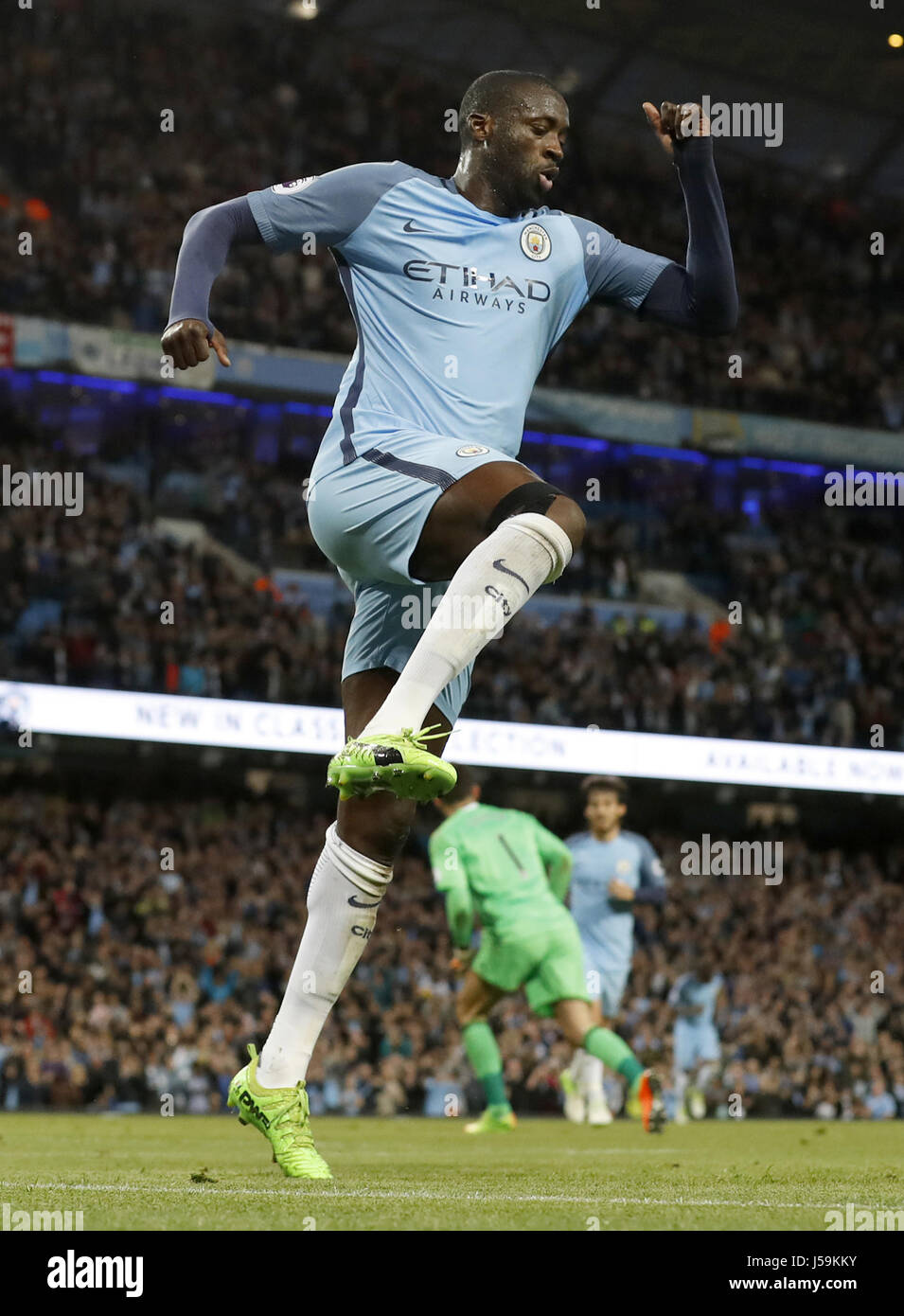 Manchester City's Yaya Toure celebrates scoring his side's third goal ...