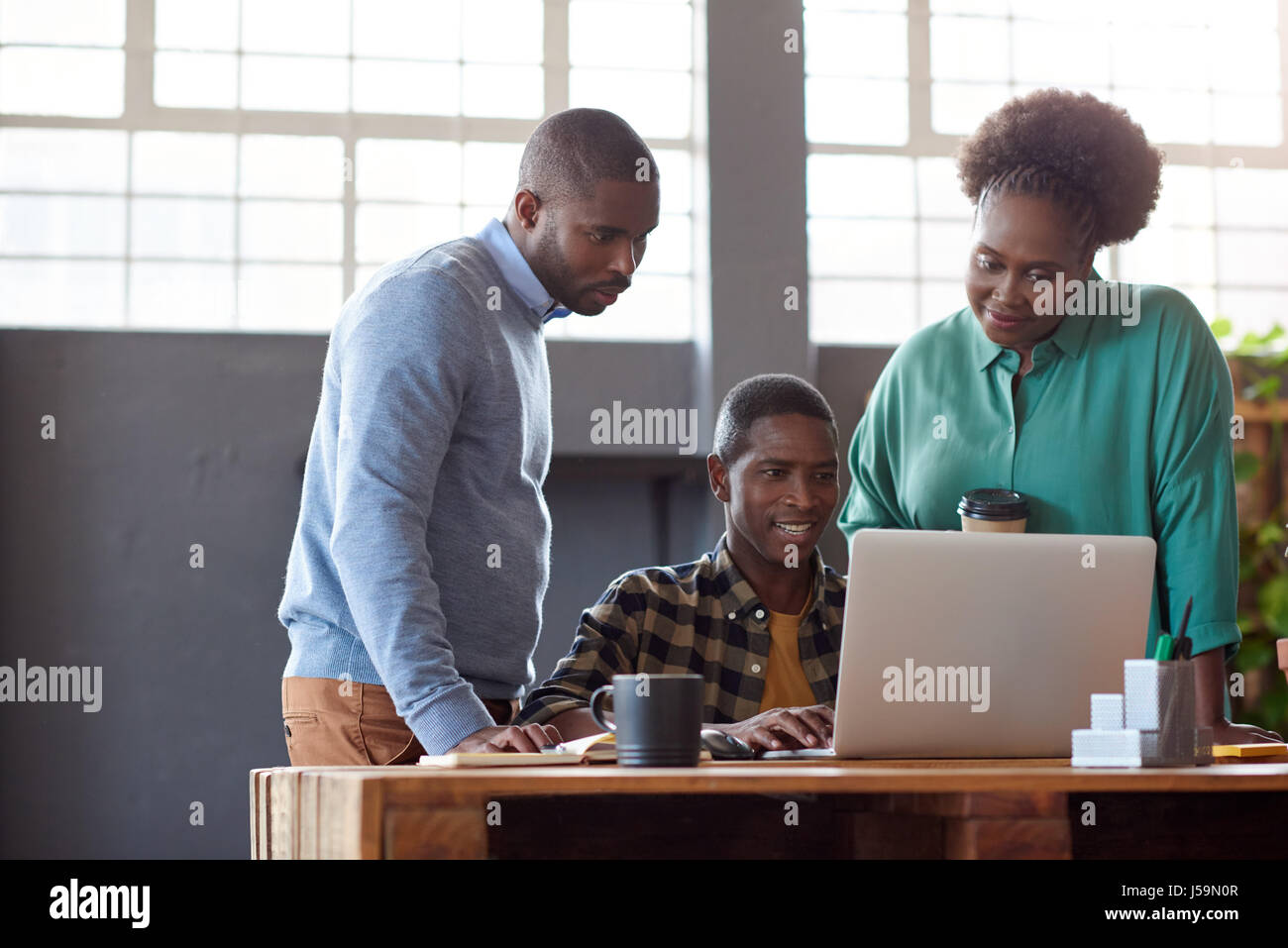 African american working group hi-res stock photography and images - Alamy