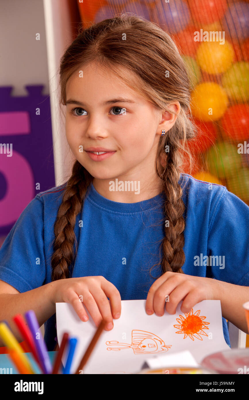 Small students girl painting in art school class Stock Photo - Alamy