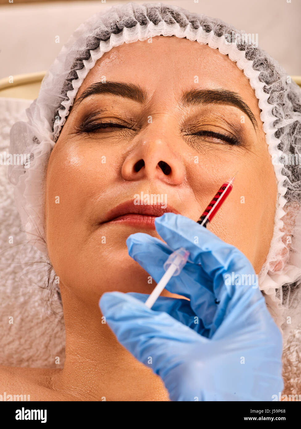 Fillers older woman hi-res stock photography and images - Alamy