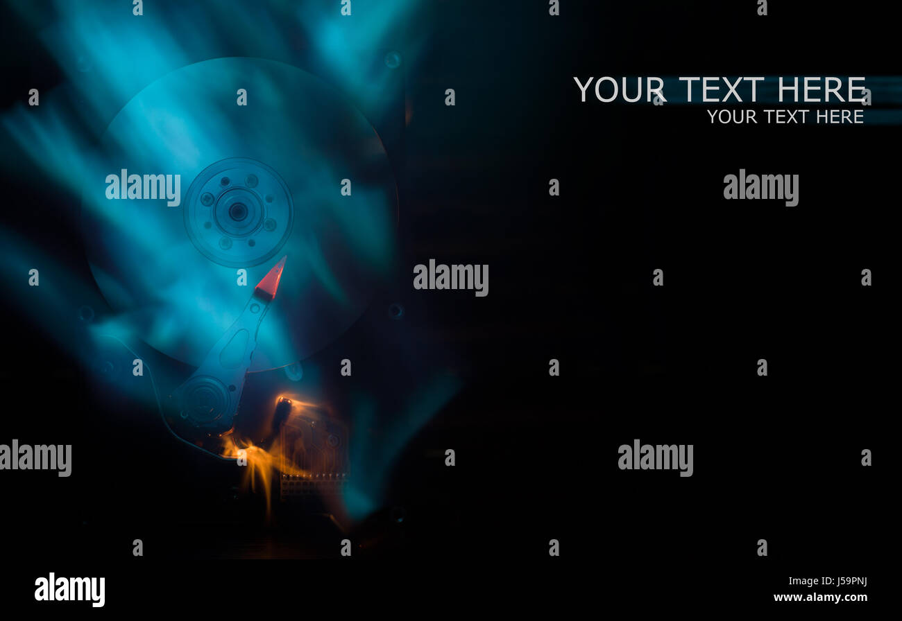 Hot hard disk > hard drive in fire - concept Stock Photo - Alamy