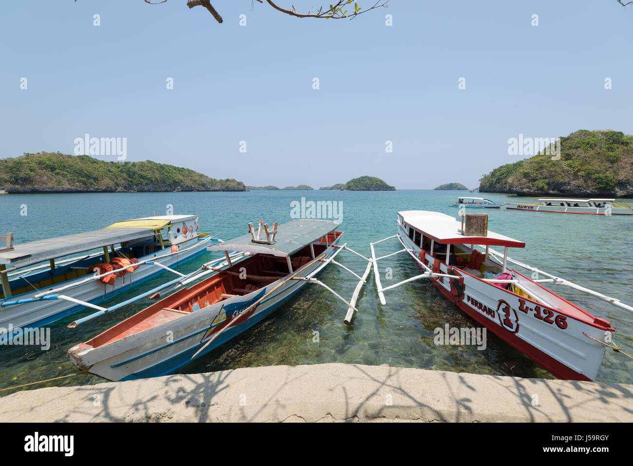 Quezon Island, Philippines - April 12, 2017: Tourists boats at the ...