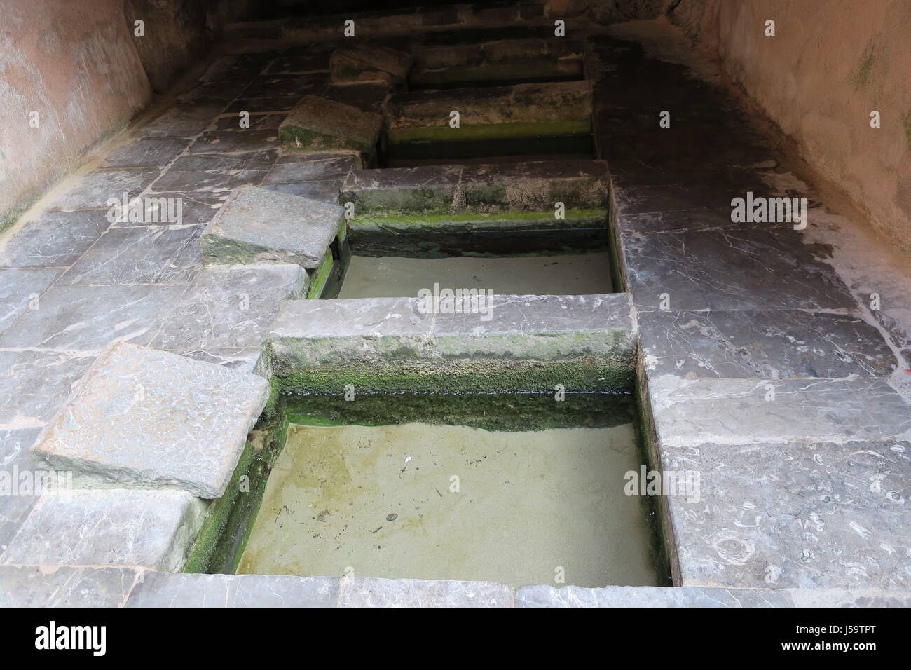 Picturesque laundry of 16th-century wash basins in Cefalu, Sicily ...