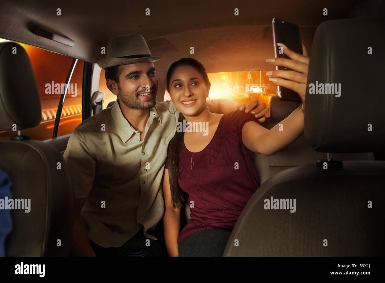 Back seat car couple hi-res stock photography and images - Alamy