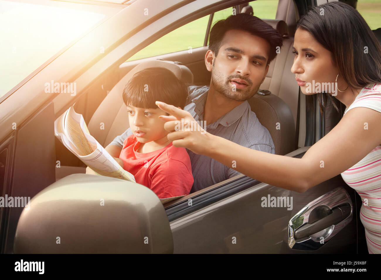 Child looking at map hi-res stock photography and images - Alamy