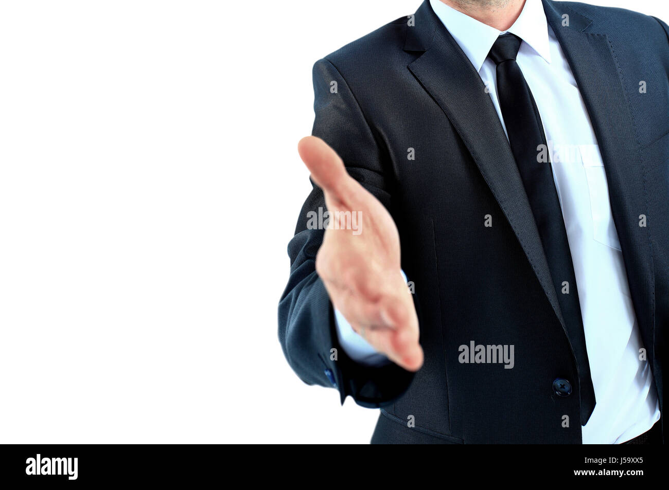 Business man saying welcome and giving hand Stock Photo - Alamy