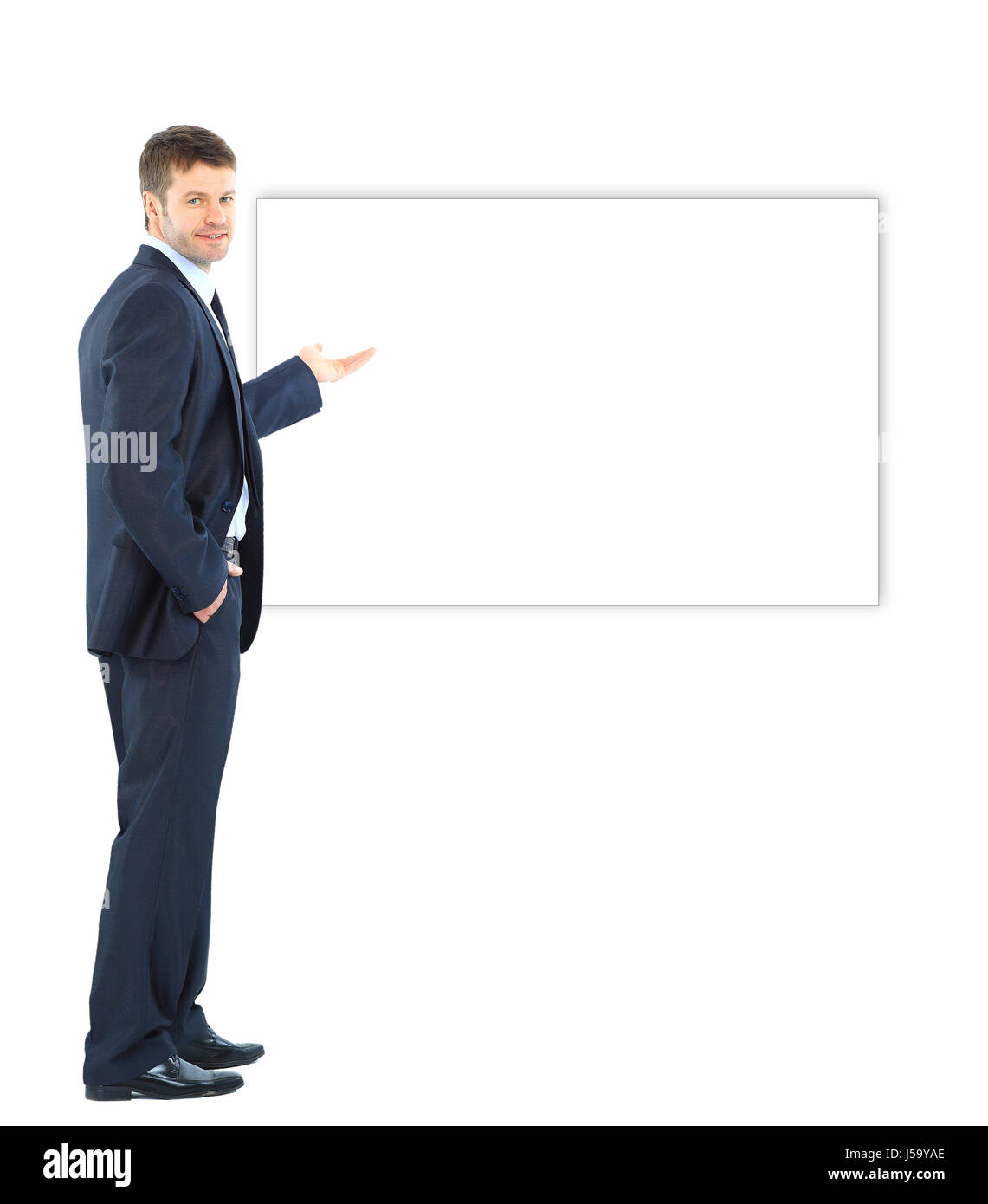 Happy business man presenting and showing with copy space for your text ...