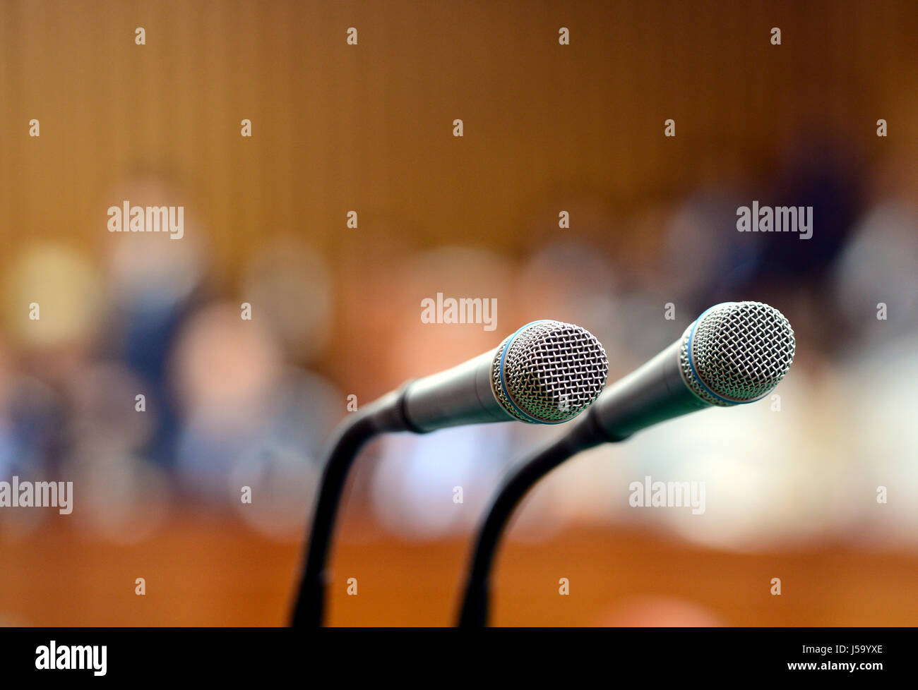 Two microphones in the hall Stock Photo - Alamy